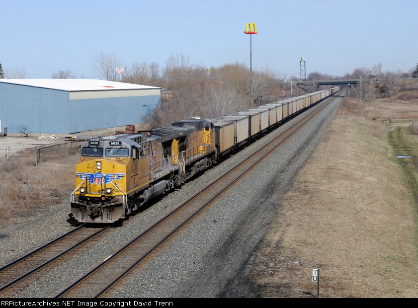UP 6058 leads Westbound CSX E958 at MP 70 on track number one.